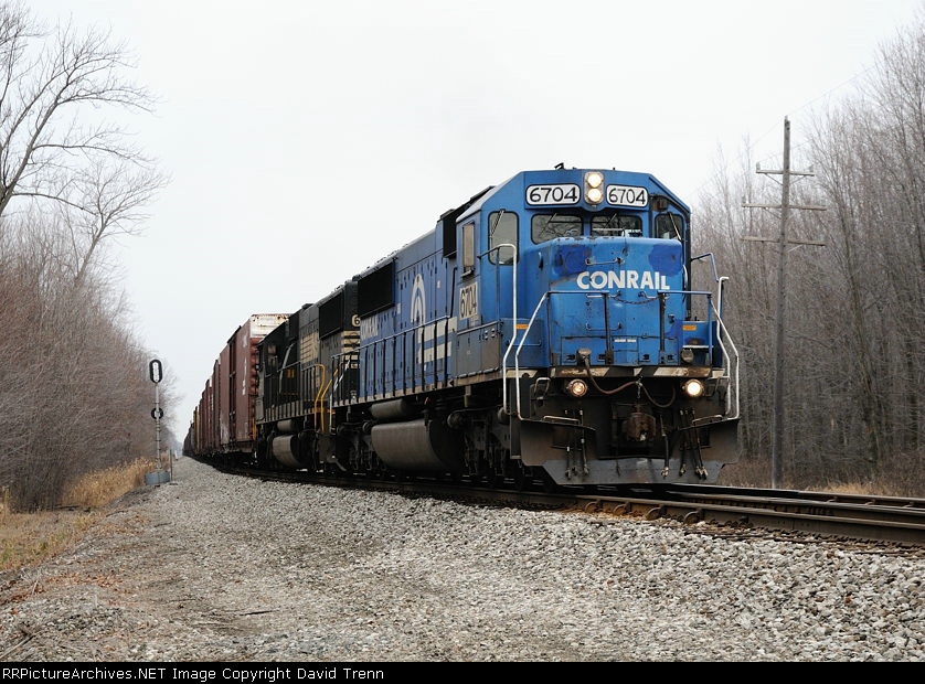 NS (CR) 6704 leads Westbound NS 145 [coming off the siding] at Reed Rd